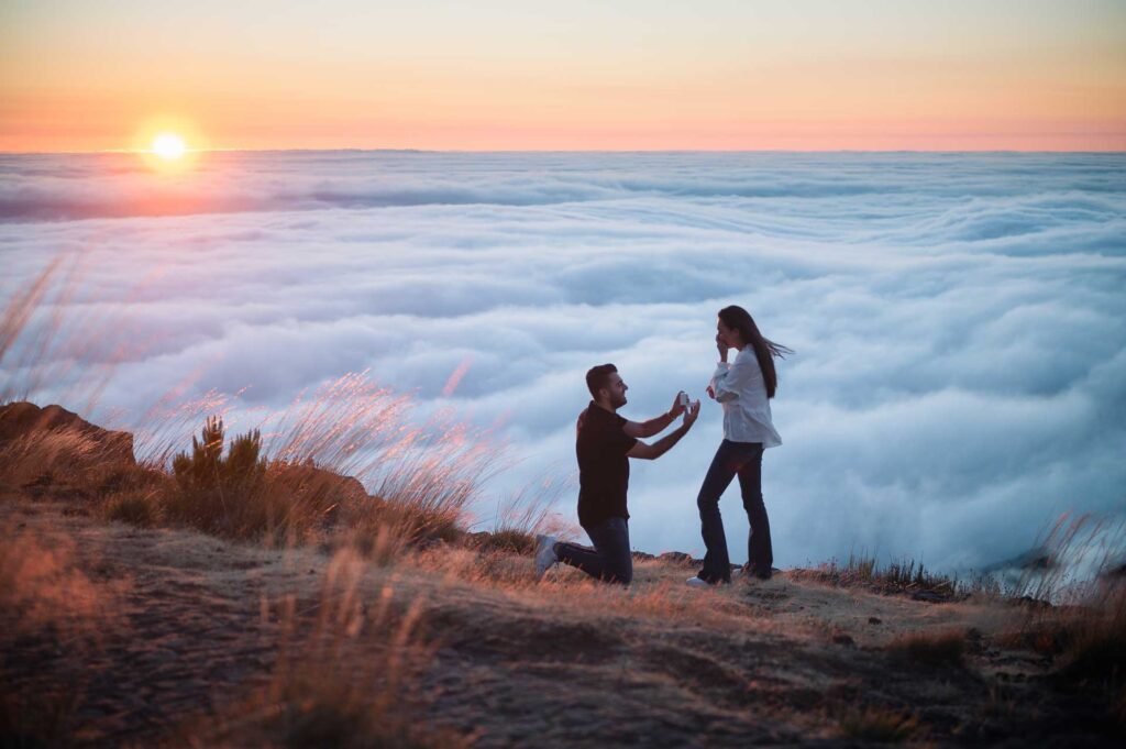 Sunrise marriage proposal above the clouds - Islandpic